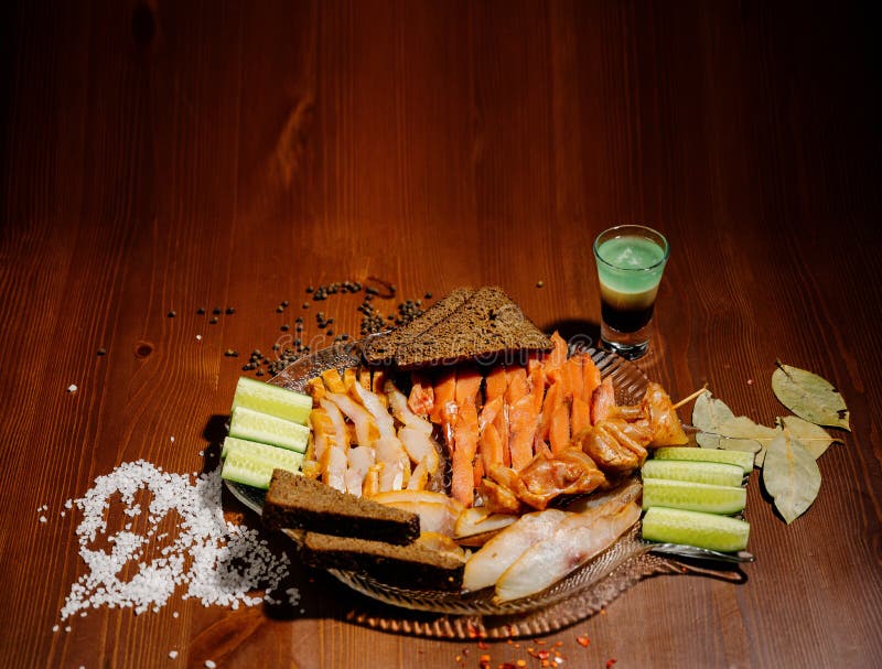 Fish Appetizer of Dried Fish Pieces on a Plate Stock Photo - Image of ...