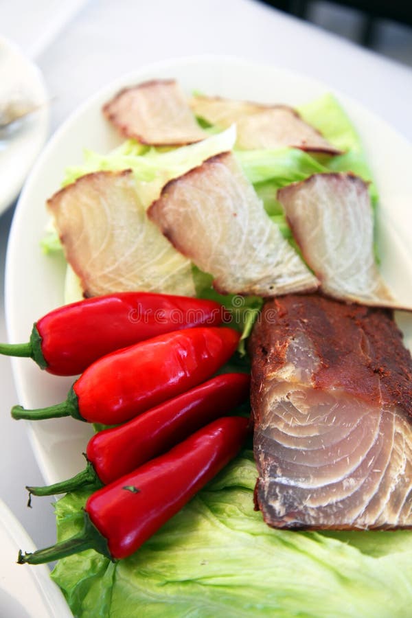 Fish bacon with red pepper stock photo. Image of garnish - 148860626