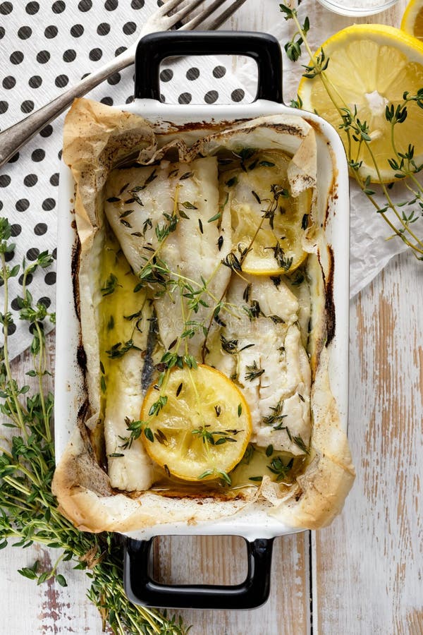 Fish Baked in Lemon Thyme Marinade Stock Photo - Image of lemon, fresh ...