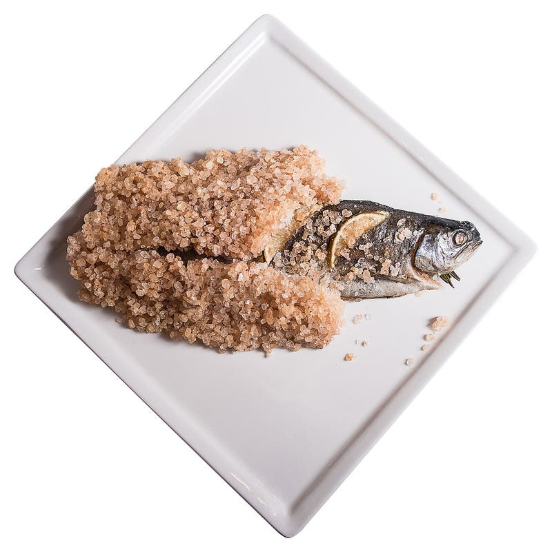 Fish Baked in Salt Crust stock image. Image of tableware - 54806791