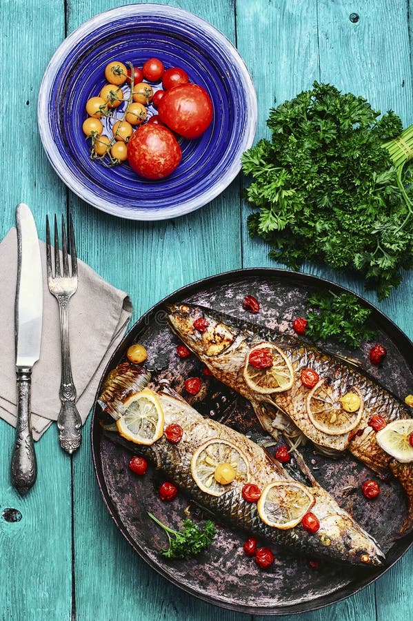 Fish baked in stylish pan stock image. Image of grill - 78490633