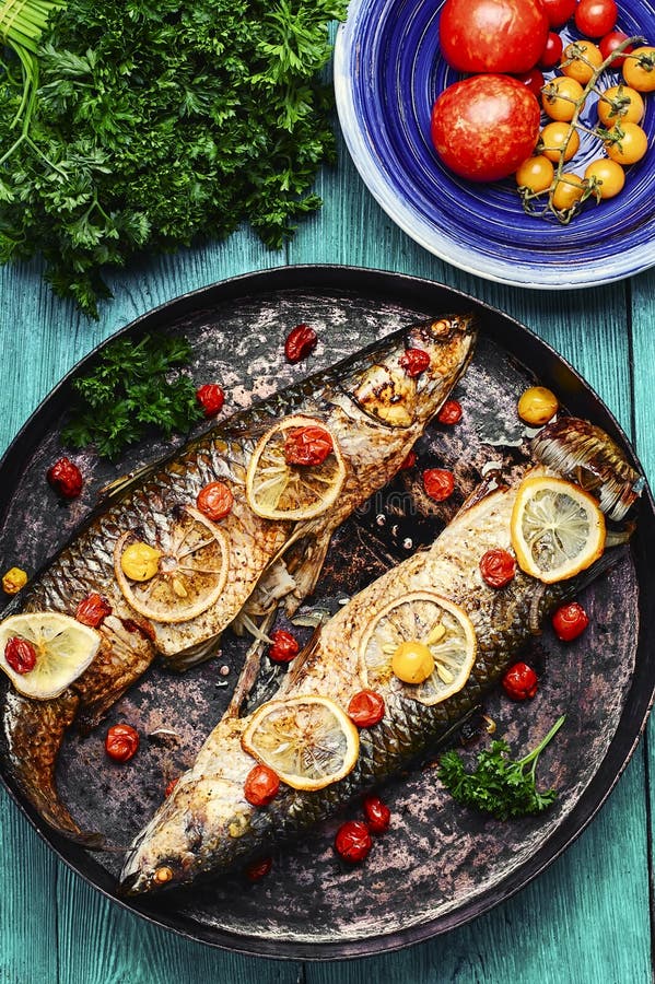 Fish baked in stylish pan stock photo. Image of gourmet - 78490666