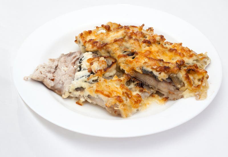 Fish baked under cheese stock image. Image of fillets - 24682483