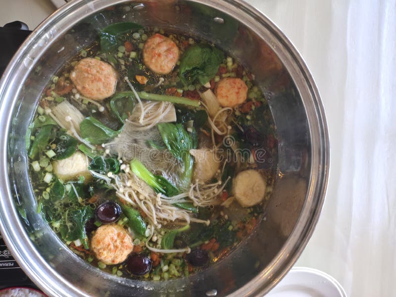 Fish Ball in Hot Pot with Herbal Sup Stock Photo - Image of plant, fish ...