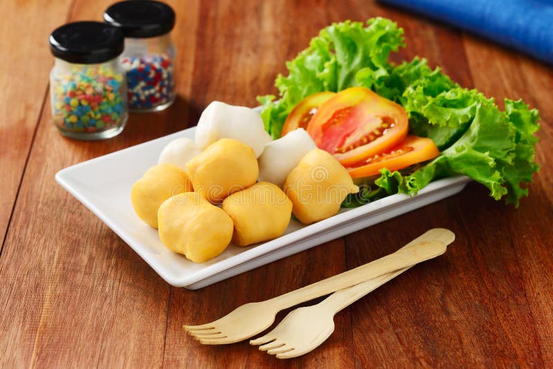 Fish Balls with Vegetables on Dish and Wooden Spoon Fork on Wooden ...