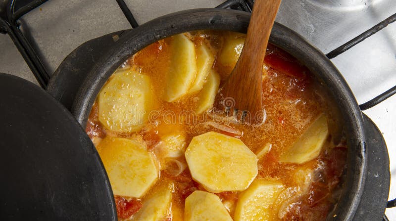 Fish Being Cooked in a Clay Pot Stock Image - Image of table, fresh ...