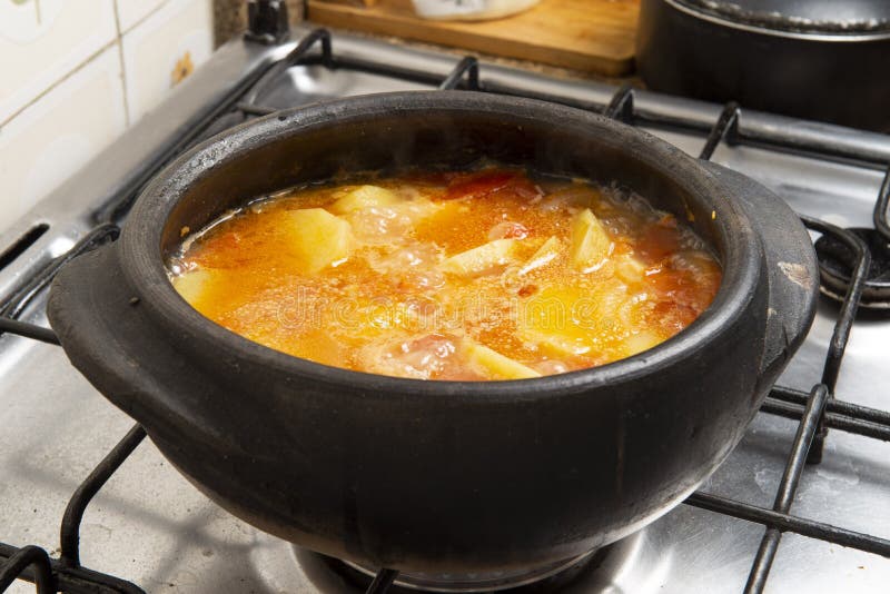 Fish Being Cooked in a Clay Pot Stock Image - Image of cuisine, dinner ...
