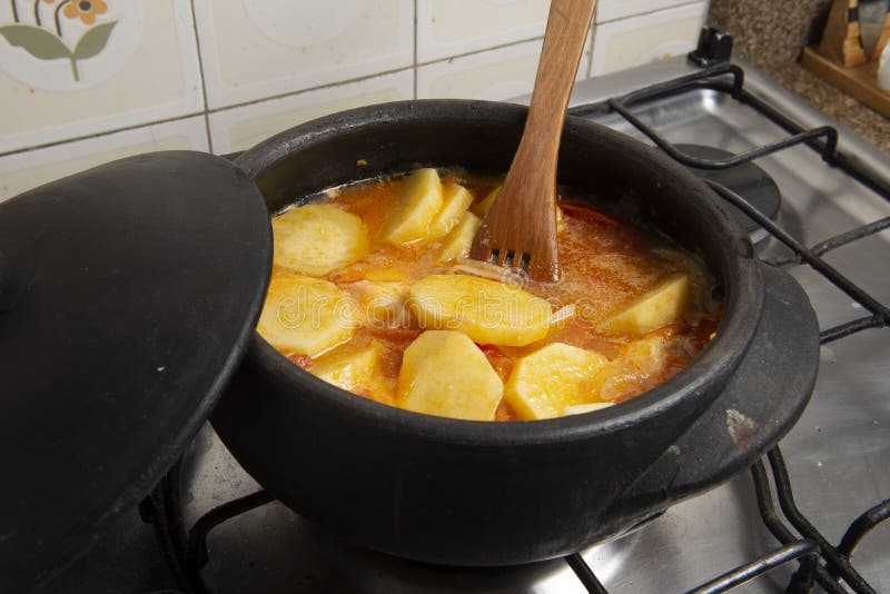 Fish Being Cooked in a Clay Pot Stock Photo - Image of cooking ...