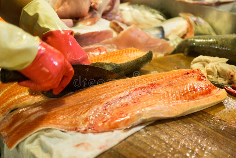 Fish Being Cut at Fishmongers Stock Image - Image of hands, supermarket ...
