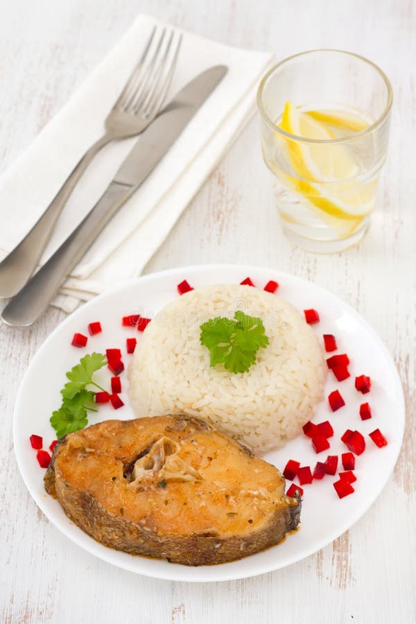 Fish with boiled rice stock image. Image of sauce, rice - 25534129