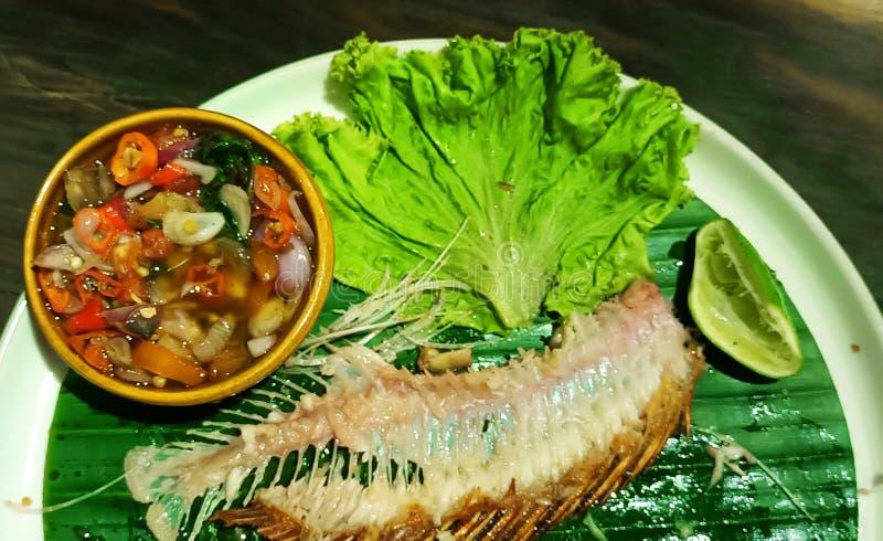 The Fish Bone Food Leftover with Chili and Onion Sauce Stock Photo ...