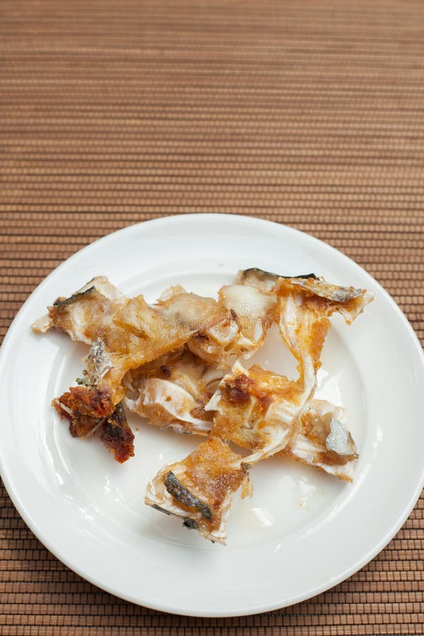 Fish bones on a plate stock photo. Image of food, health - 97646054