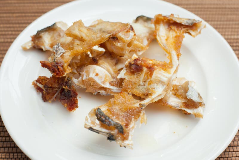 Fish bones on a plate stock image. Image of roasted, health - 97646173
