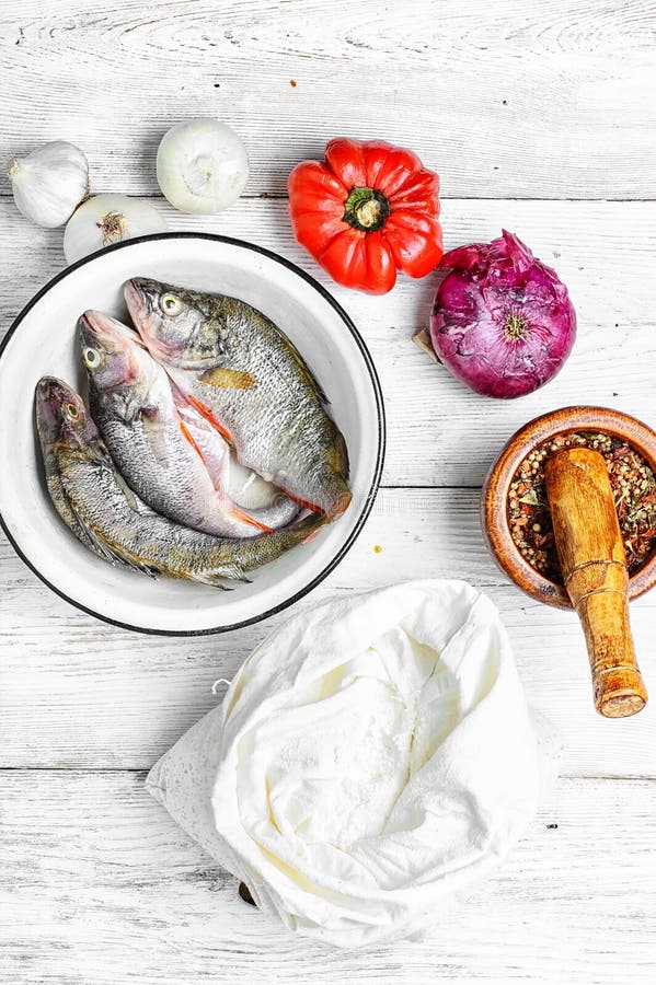 Fish in bowl stock image. Image of table, dinner, fish - 76479553