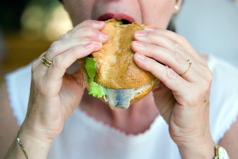 Fish bread roll stock image. Image of hold, front, mouth - 12342949