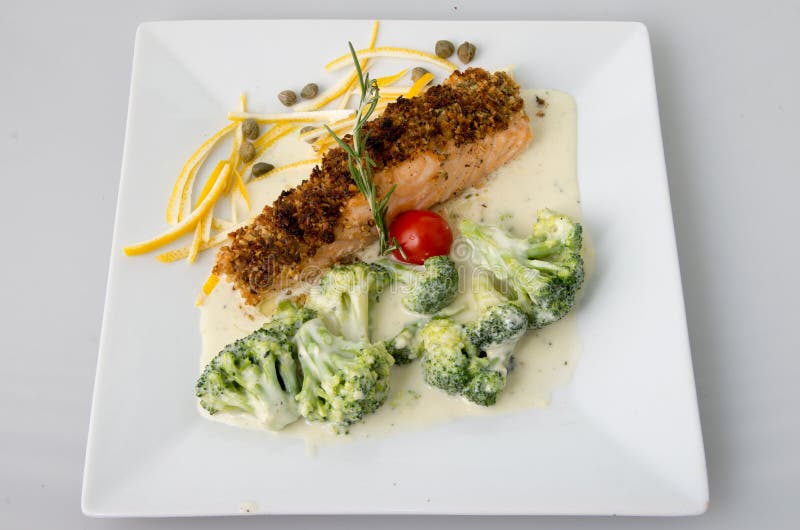 Fish with Broccoli in Cream Sauce. Stock Photo - Image of tomatoes ...
