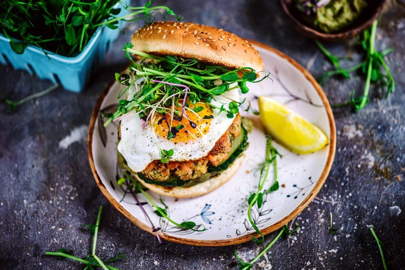 Fish Burger with Avocado Sauce Stock Photo - Image of green, tasty ...