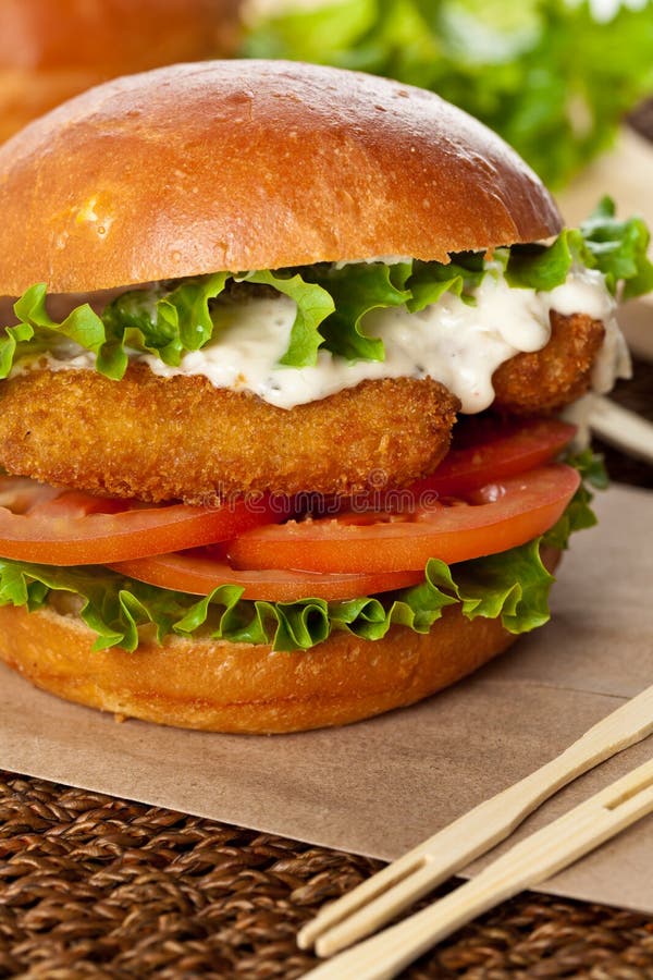 Fish burger stock image. Image of lettuce, board, dinner - 52265663