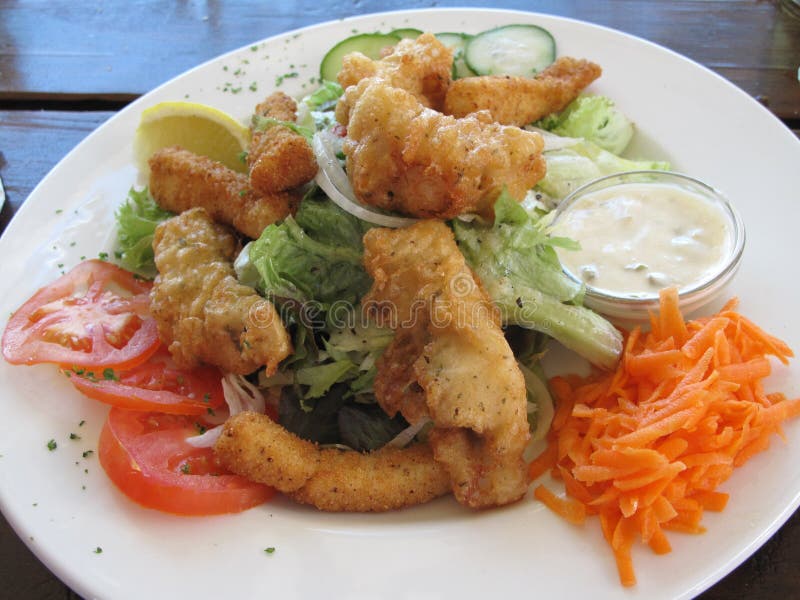 Fish and Calamari Dinner stock photo. Image of seafood - 7991712