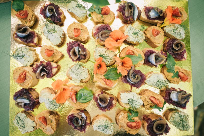 Fish canapes on a table stock photo. Image of decoration - 329458136