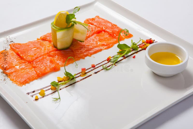 Fish Carpaccio. Carpaccio of Salmon on White Plate Stock Image - Image ...