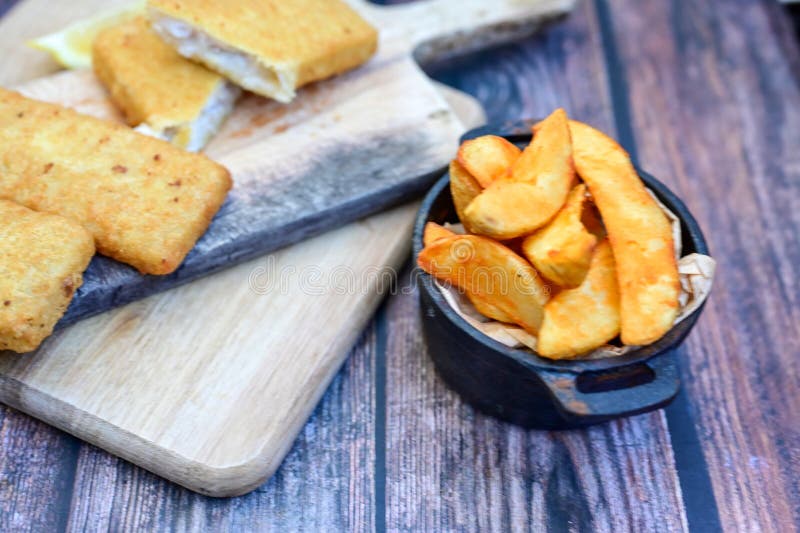 Fish and Chips.Close Up of Crispy Breaded Deep Fried Alaska Pollock ...