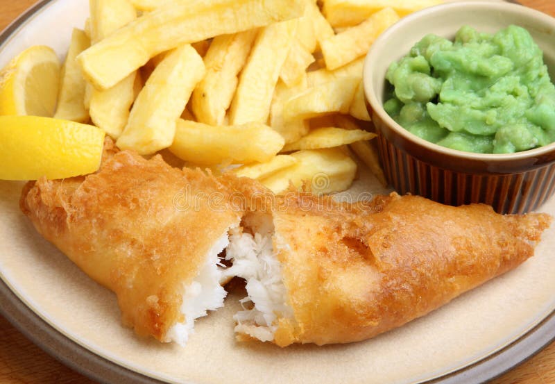 Fish, Chips and Mushy Peas stock photo. Image of batter - 33621018