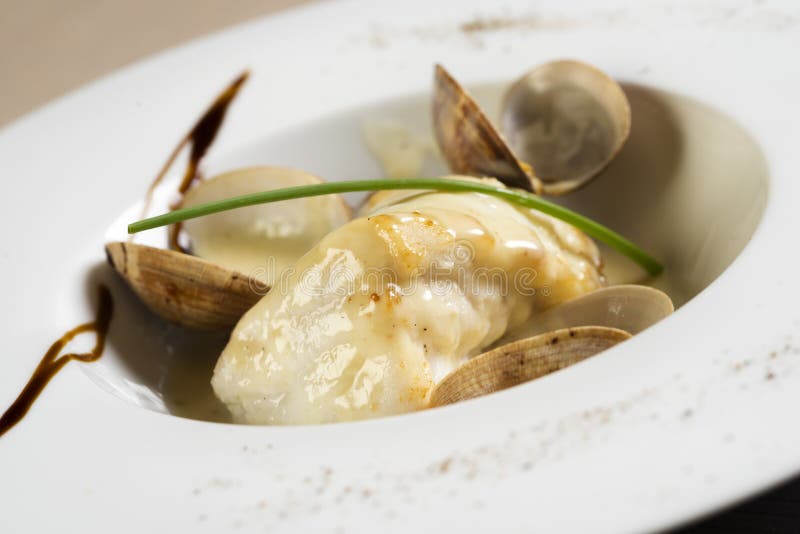 Fish with clams stock image. Image of serving, size, food - 47770023