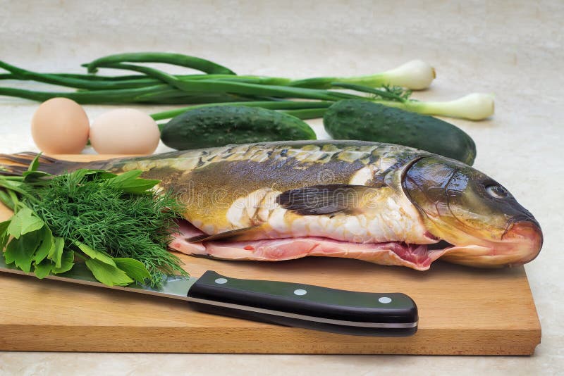 Fish and Components for Her Preparation: Vegetables, Spices, Onions ...
