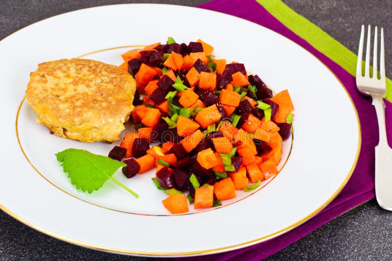 Fish Cutlet with a Salad of Carrots and Beets. Stock Image - Image of ...