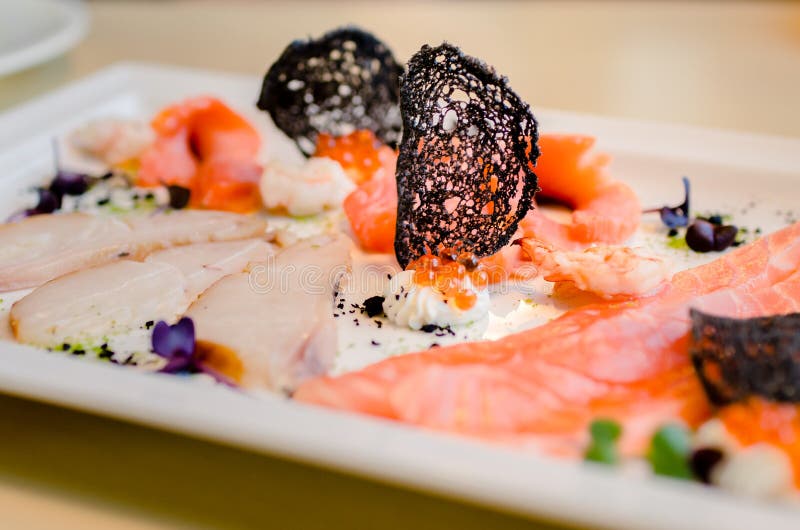 Fish Cutting. Pieces of Different Fish on a Plate with Cream Cheese and ...