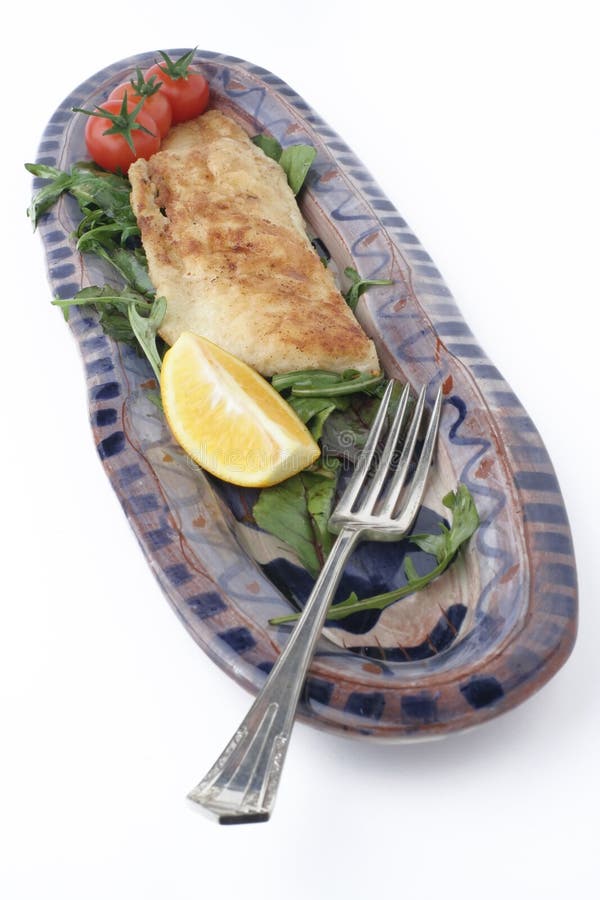 Fish Dinner on Ceramic Platter; Angled Fork Stock Photo - Image of ...