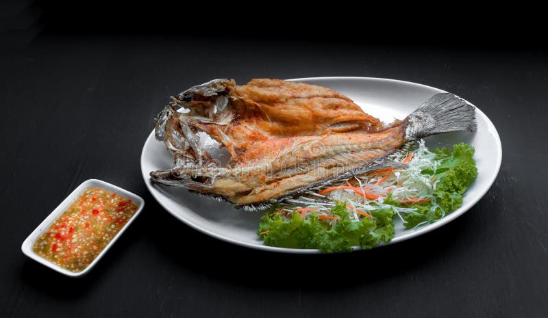 Fish Dish - Dee[ Fried Snapper Fish Eat with Spicy Sauce Stock Image ...