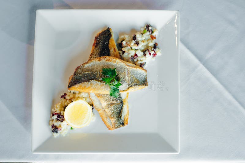 Fish Dish - Fish Fillet and Vegetables in Restaurante Stock Photo ...