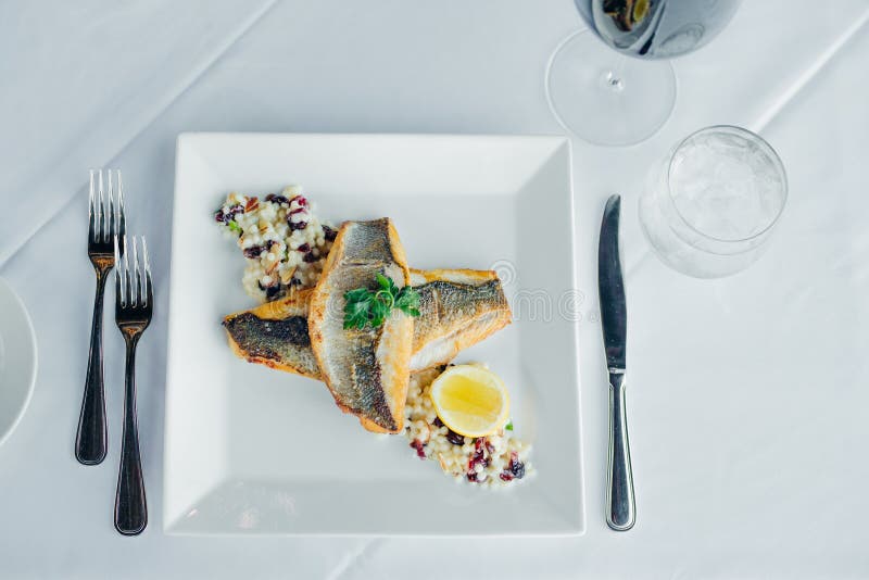 Fish Dish - Fish Fillet and Vegetables in Restaurante Stock Image ...