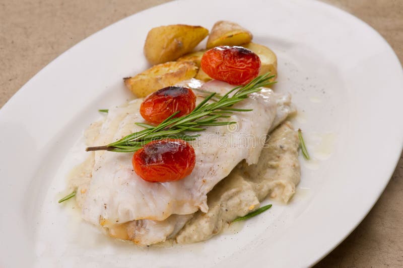 Fish Dish - Fish Fillet in Sauce and Vegetables Stock Photo - Image of ...