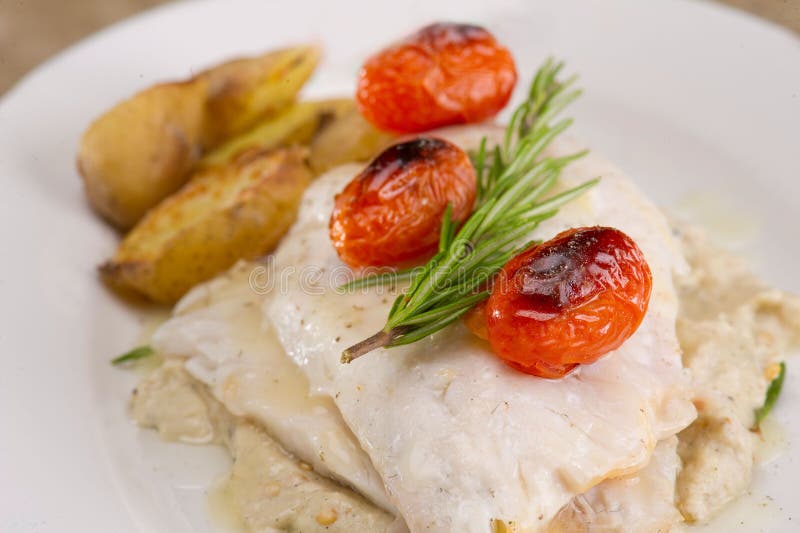 Fish Dish - Fish Fillet in Sauce and Vegetables Stock Photo - Image of ...