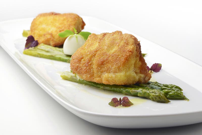 Fish Dish Salt Cod Breaded Milanese Style with Asparagus Stock Photo ...