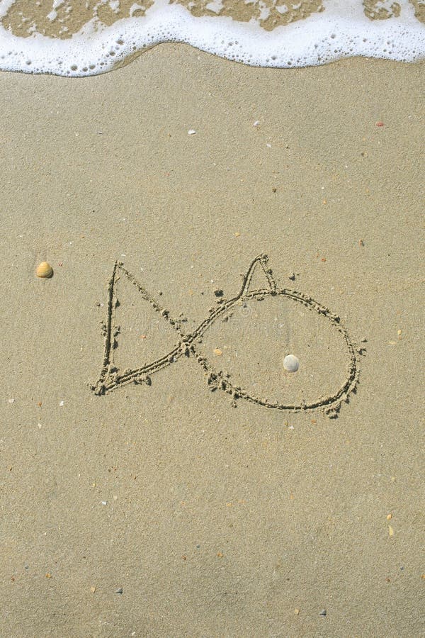Fish drawn in the sand stock photo. Image of font, bright - 120957090