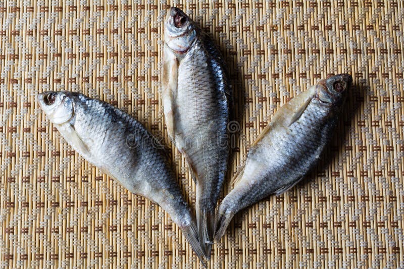 Fish dried on the Mat stock photo. Image of scales, white - 69403162