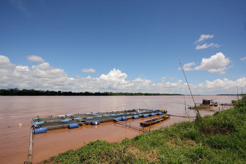 Fish farms in Khong river stock photo. Image of environment - 52021620