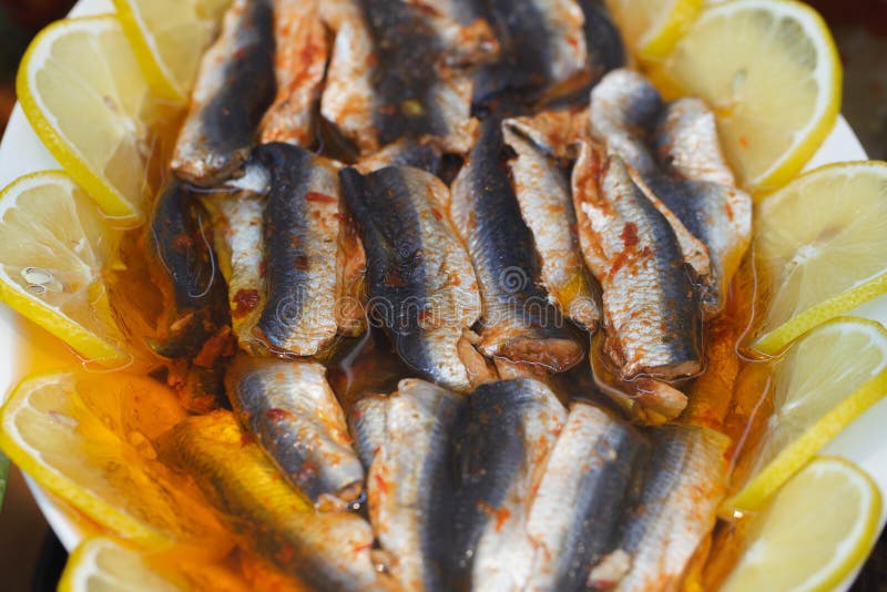 Fish Fillet Cooked Pickled Pieces with Spices and Lemon Stock Image ...