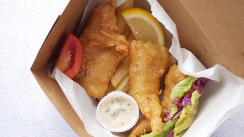 Fish Fillet , Chips and Potato Mash on Table Stock Footage - Video of ...