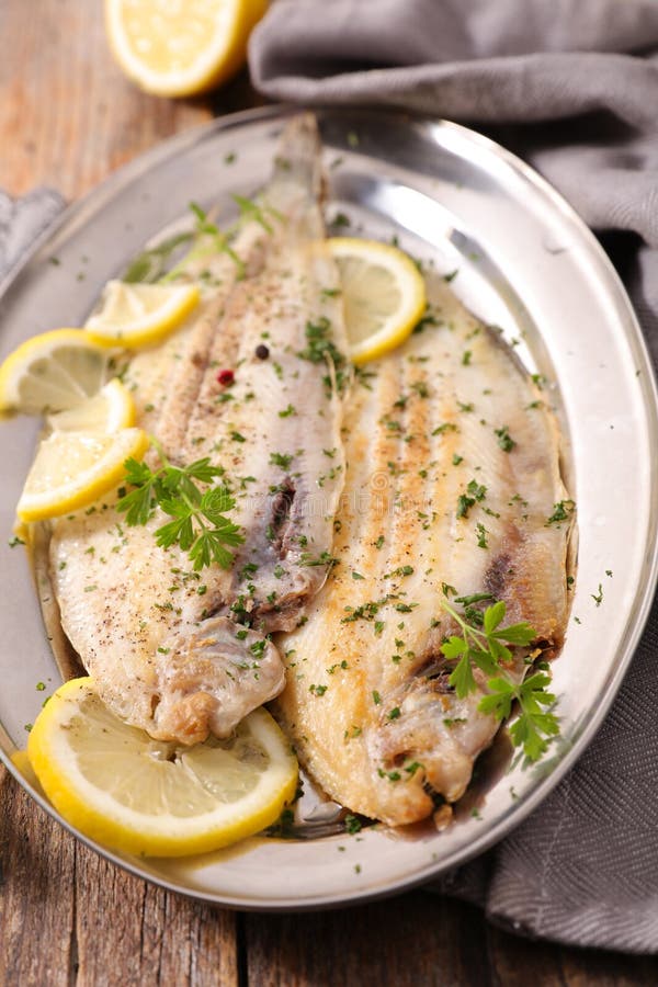 Fish fillet with lemon stock photo. Image of meal, lemon - 169583510