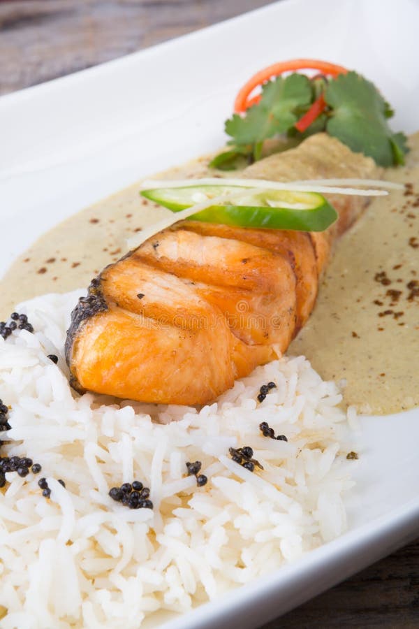 Fish Fillet Served with Rice Stock Image - Image of dining, gravy: 85606269