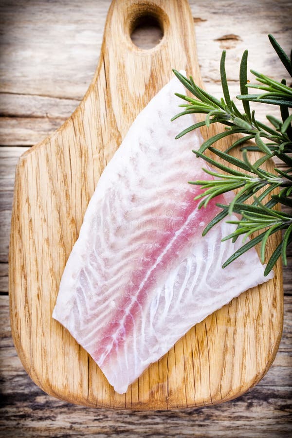 Fish Fillet in Spices and Rosemary. Stock Image - Image of leaf, food ...