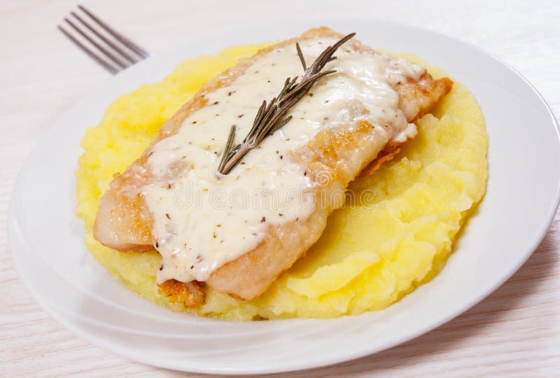 Fish Fillet Under Cheese with Mashed Potatoes Stock Image - Image of ...