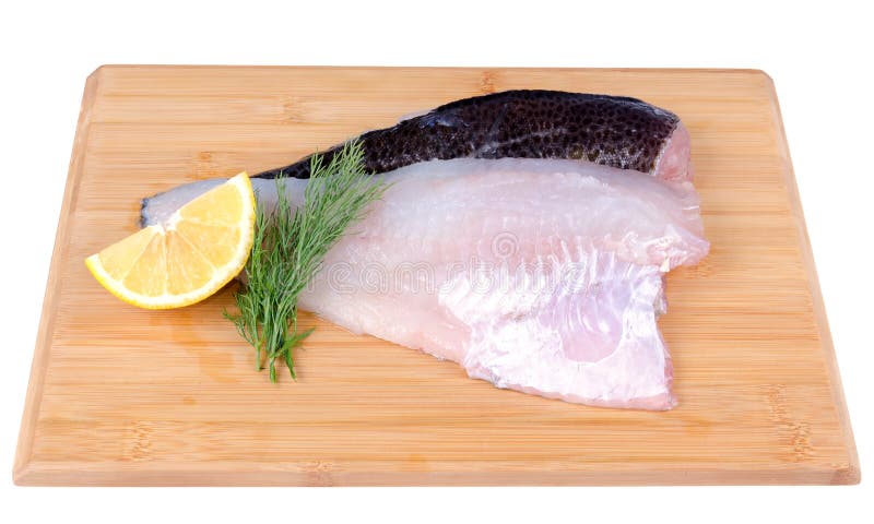 Fish fillets on a board stock photo. Image of background - 27680550
