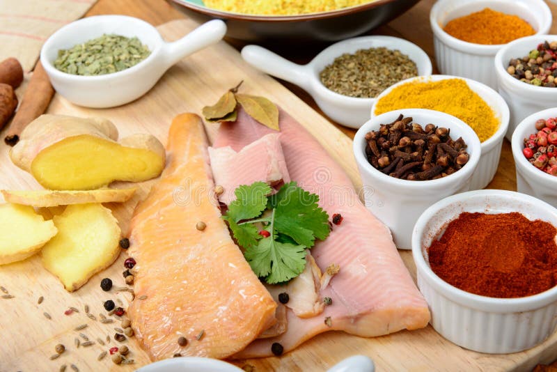 Fish fillets with spices stock image. Image of omega - 51447743