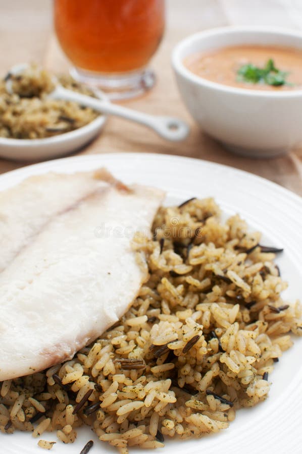 Fish Fillets with Wild Brown Rice Stock Photo - Image of seafood, meal ...